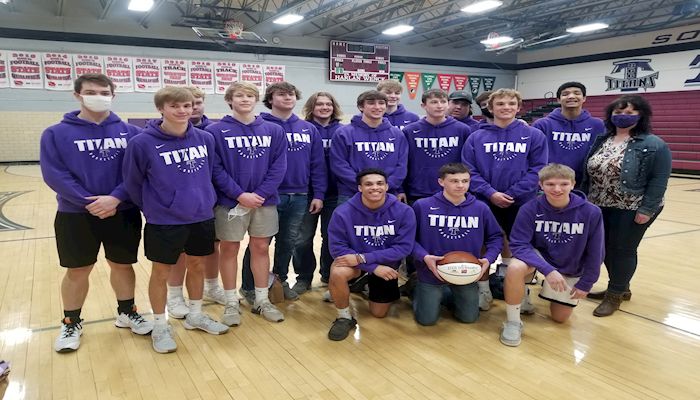 SCC Titans Receive IFBF Commemorative Basketballs